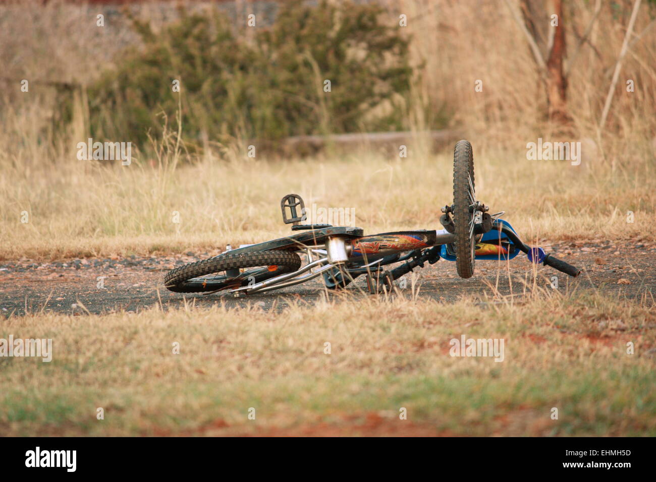 Bike laying down on side in country Stock Photo - Alamy
