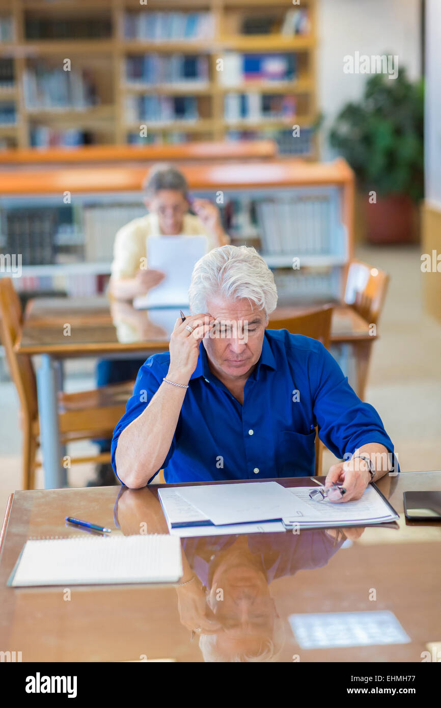 Paperwork thinking man in hi-res stock photography and images - Alamy