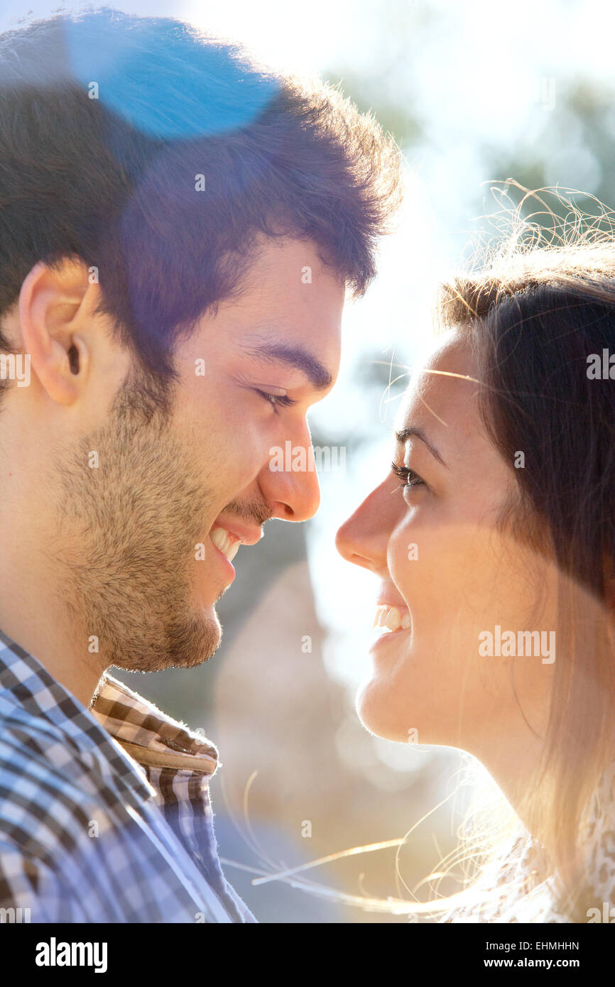 Extreme Close up portrait of romantic couple looking at each other ...