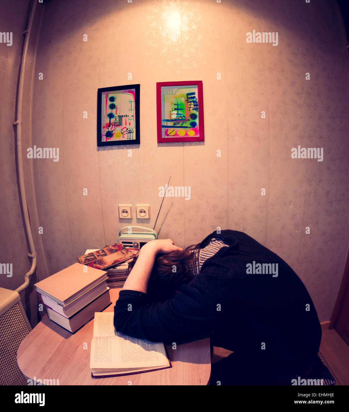 Caucasian student sleeping at table Stock Photo - Alamy