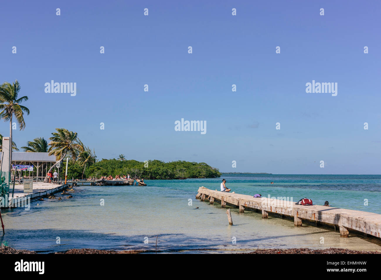 Enjoying the sun at The Split, Caye Caulker Stock Photo - Alamy