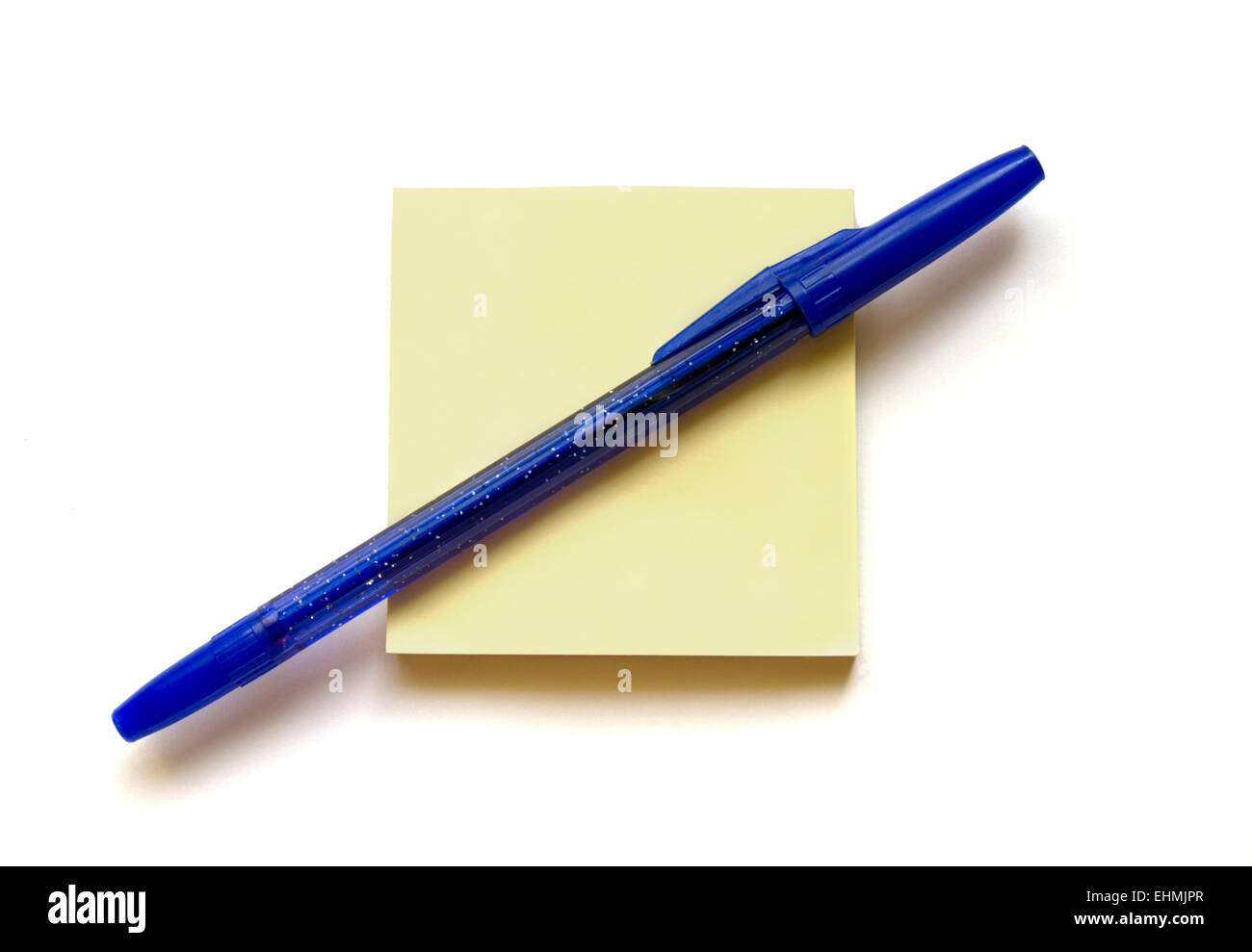 Pen and note Stock Photo - Alamy