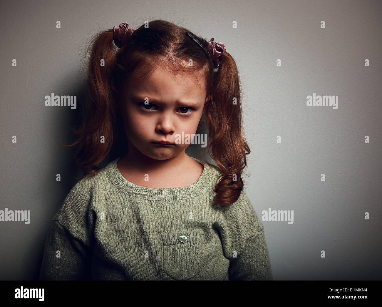 Sad looking woman dark shadow hi-res stock photography and images - Alamy