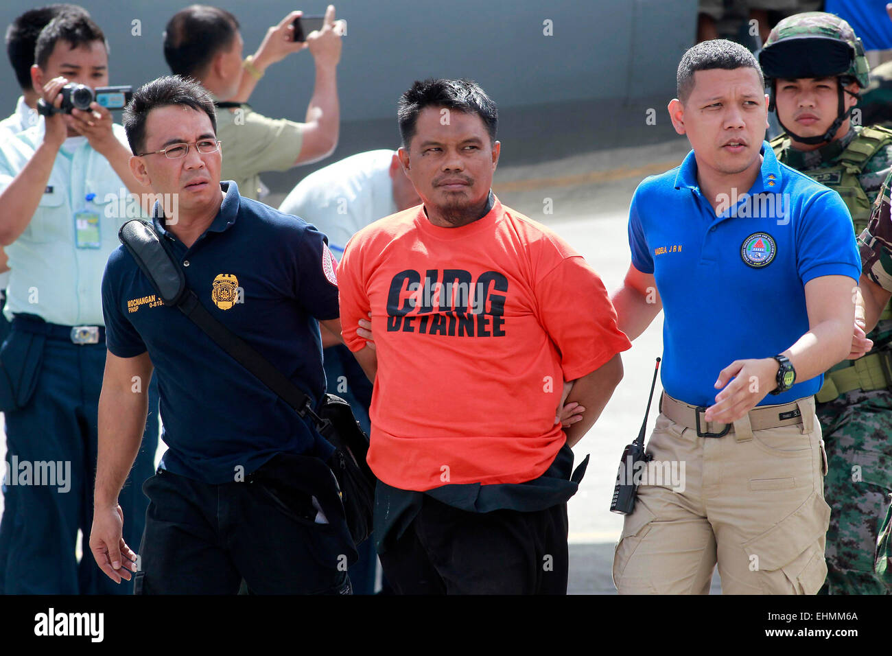 Pasay City, Philippines. 16th Mar, 2015. Mohammad Ali Tambako (C ...