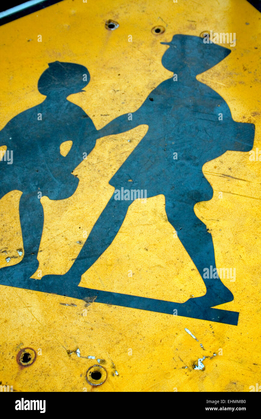 School crossing sign showing children hi-res stock photography and ...