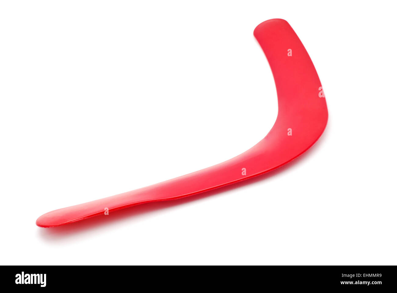 red boomerang on white background Stock Photo - Alamy