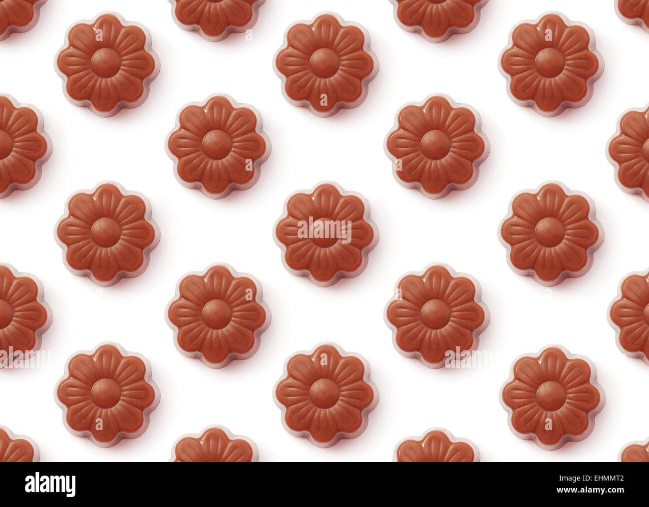flower shape chocolate candy background Stock Photo - Alamy