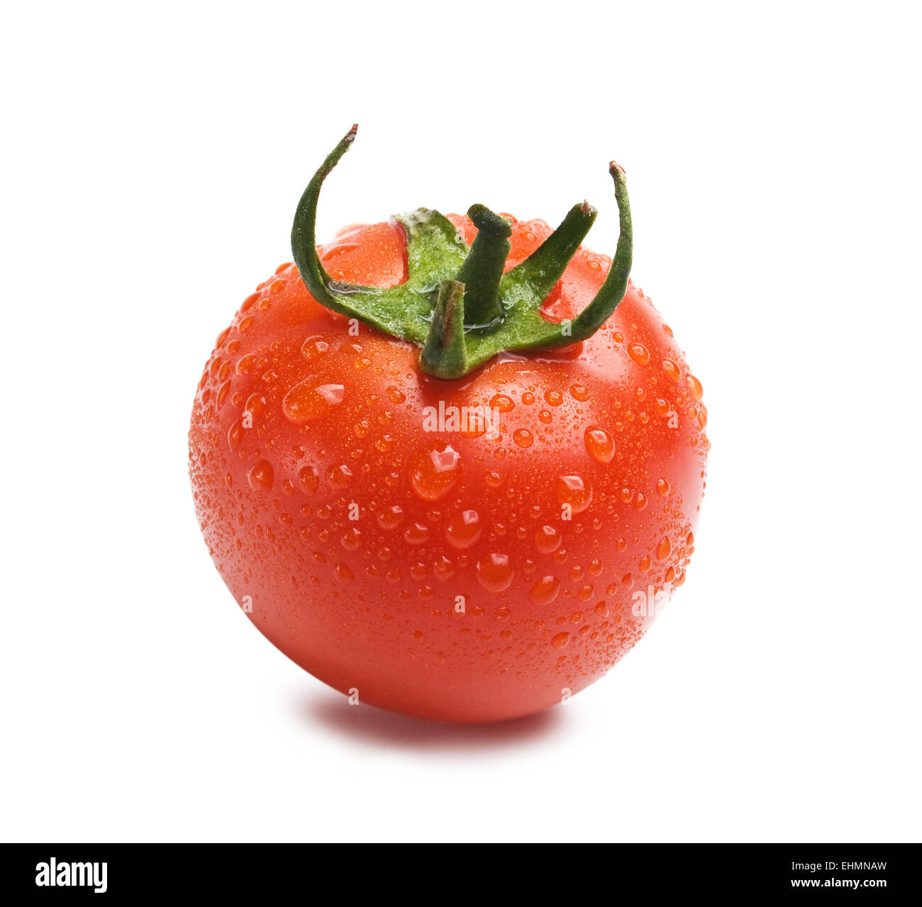 wet fresh tomato isolated on white background Stock Photo - Alamy