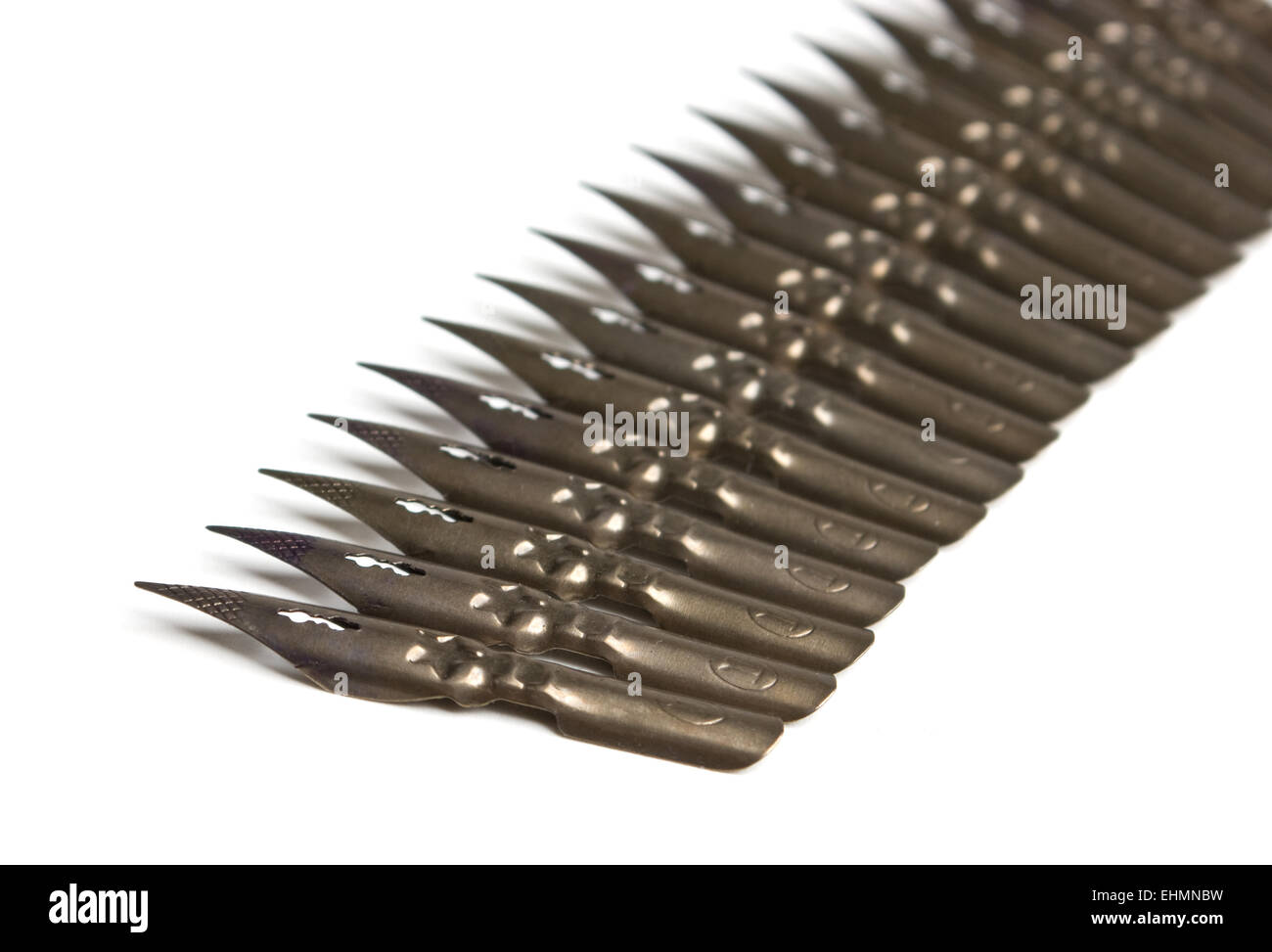 row old ink pens isolated on a white background Stock Photo - Alamy