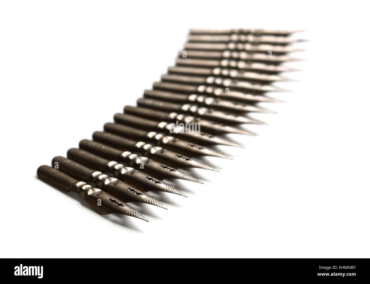 row old ink pens isolated on a white background Stock Photo - Alamy