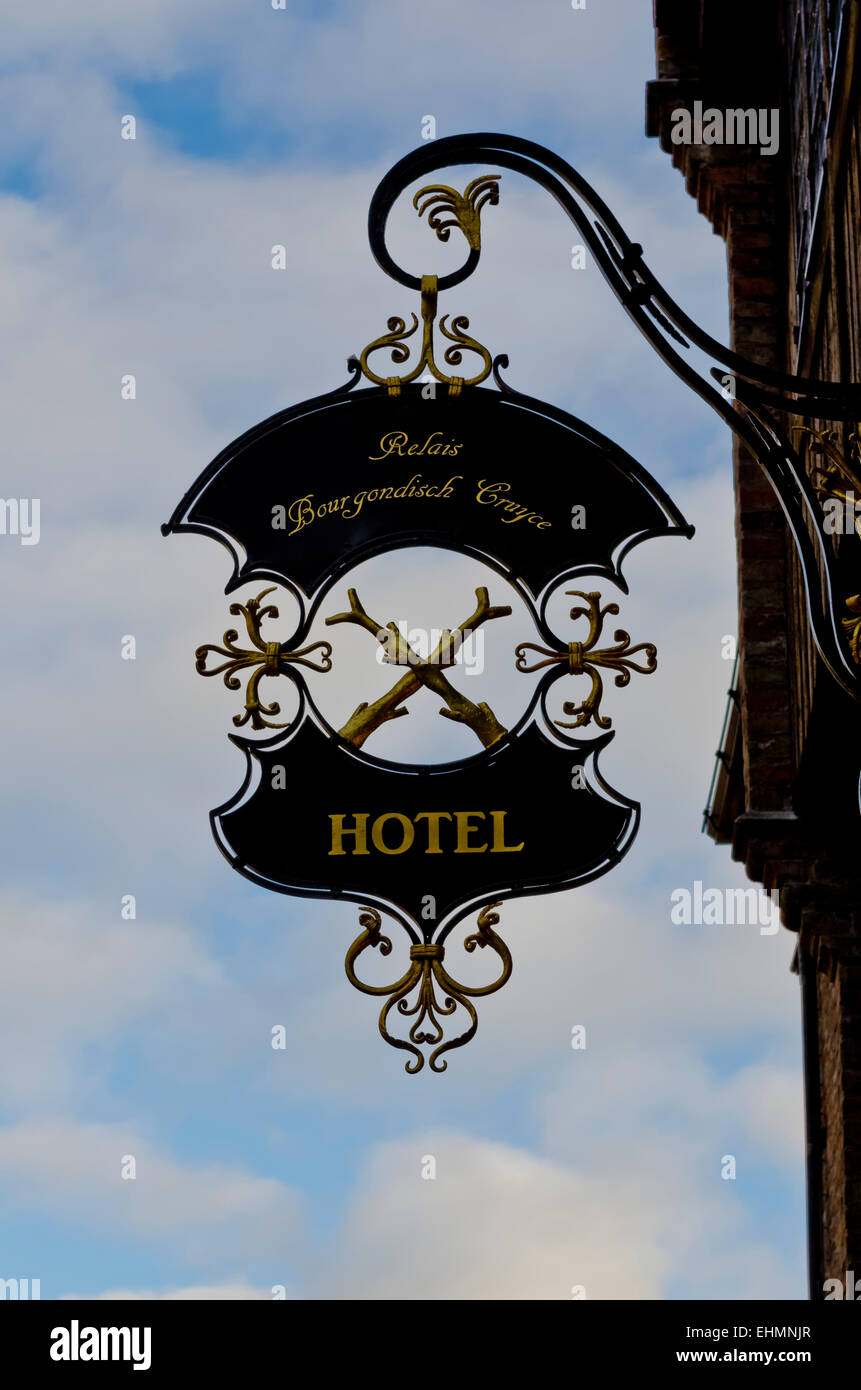Brugge hanging hotel sign Stock Photo - Alamy