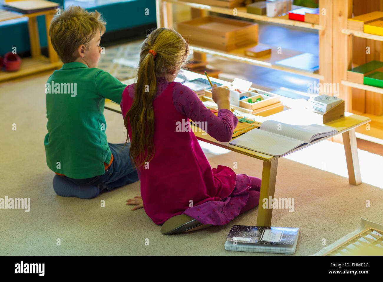 Two boys talking classroom hi-res stock photography and images - Alamy