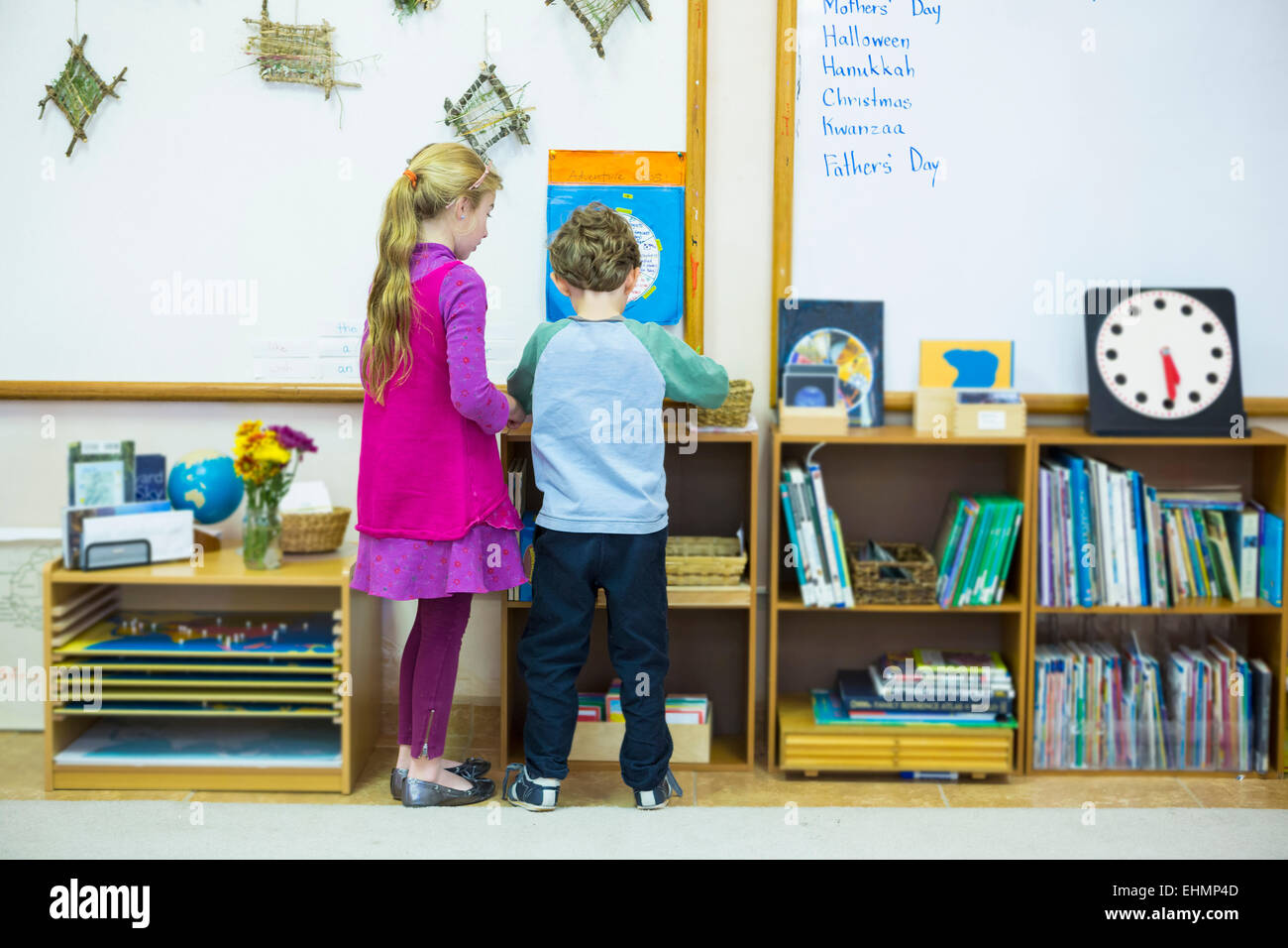 Standing classroom childhood education learning hi-res stock ...