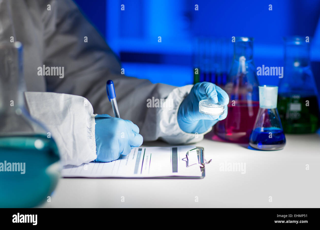 Writing research papers lab woman hi-res stock photography and images ...