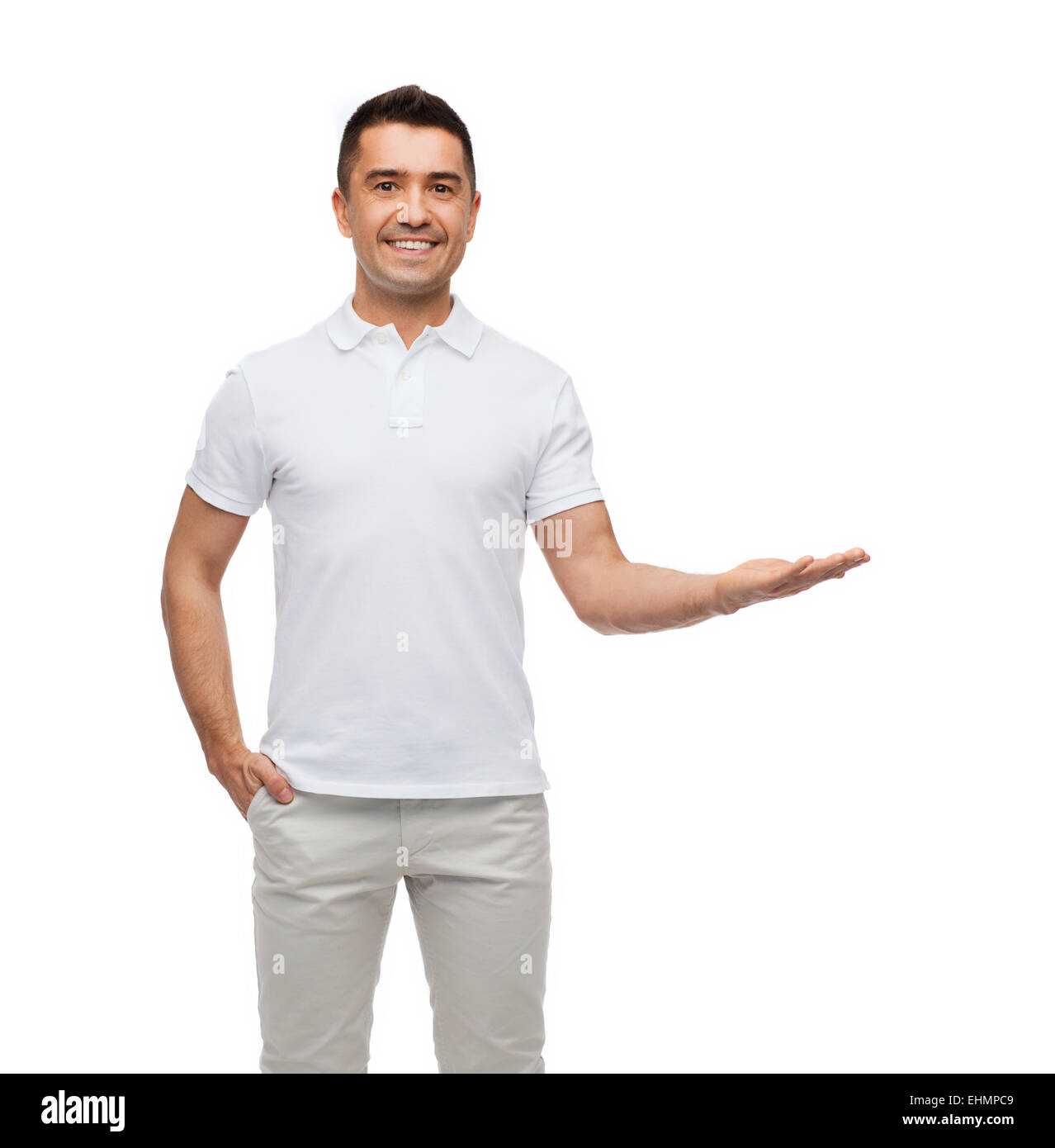 Businessman holding showing something isolated hi-res stock photography ...