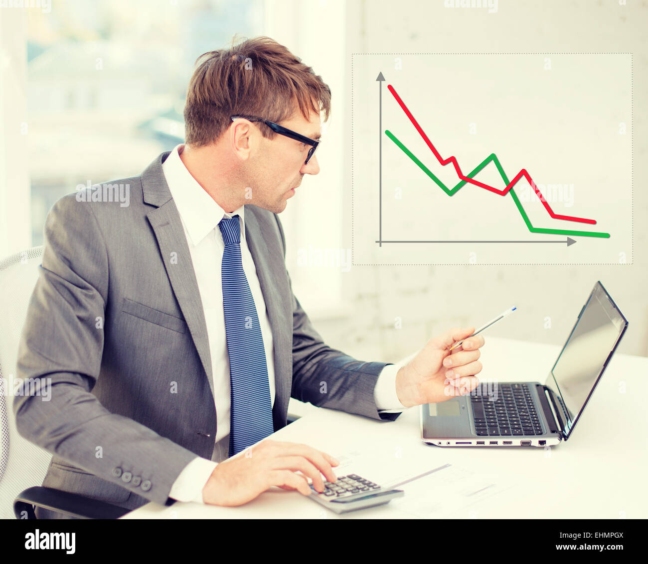 businessman with computer, papers and calculator Stock Photo - Alamy