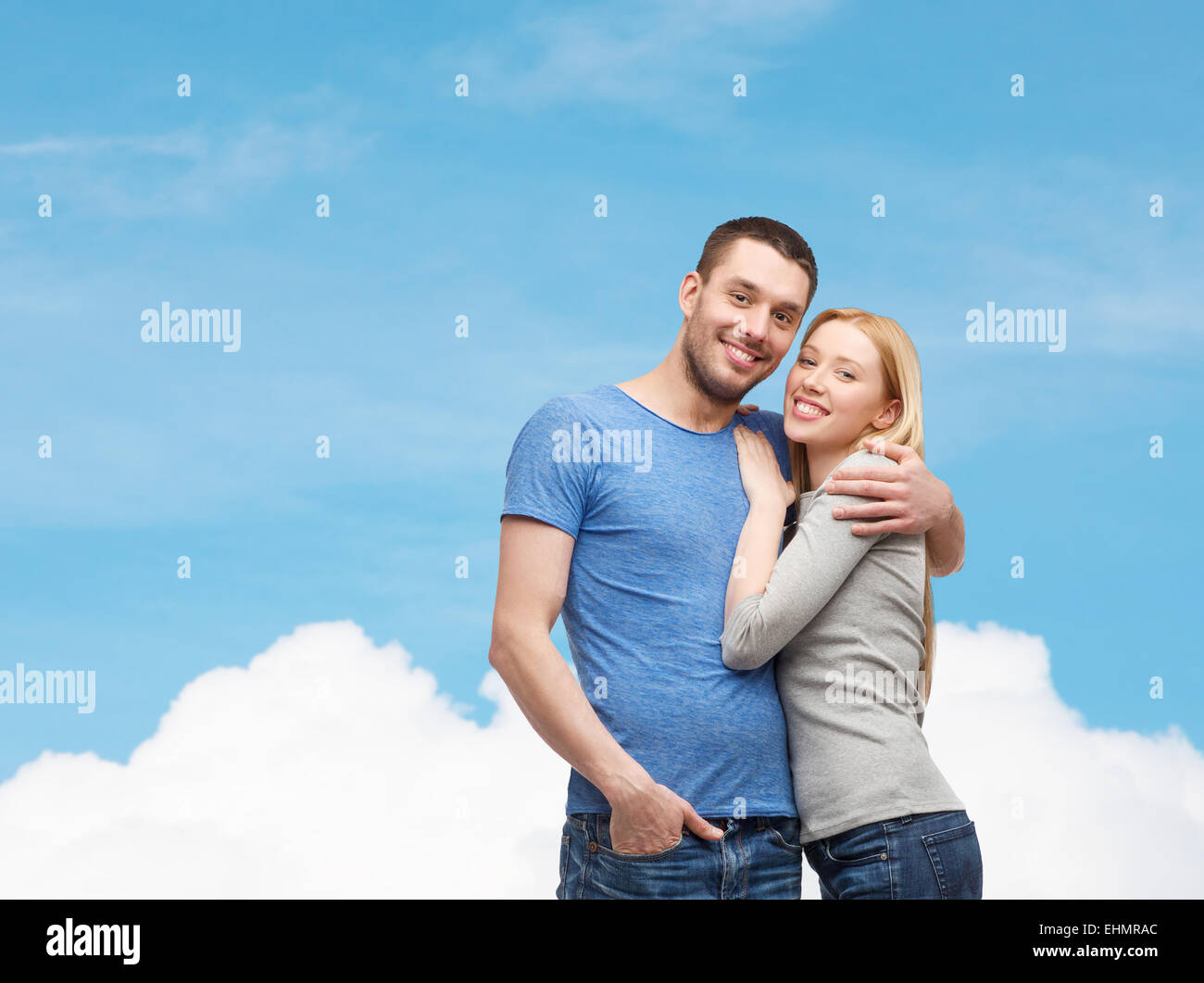 smiling couple hugging Stock Photo - Alamy