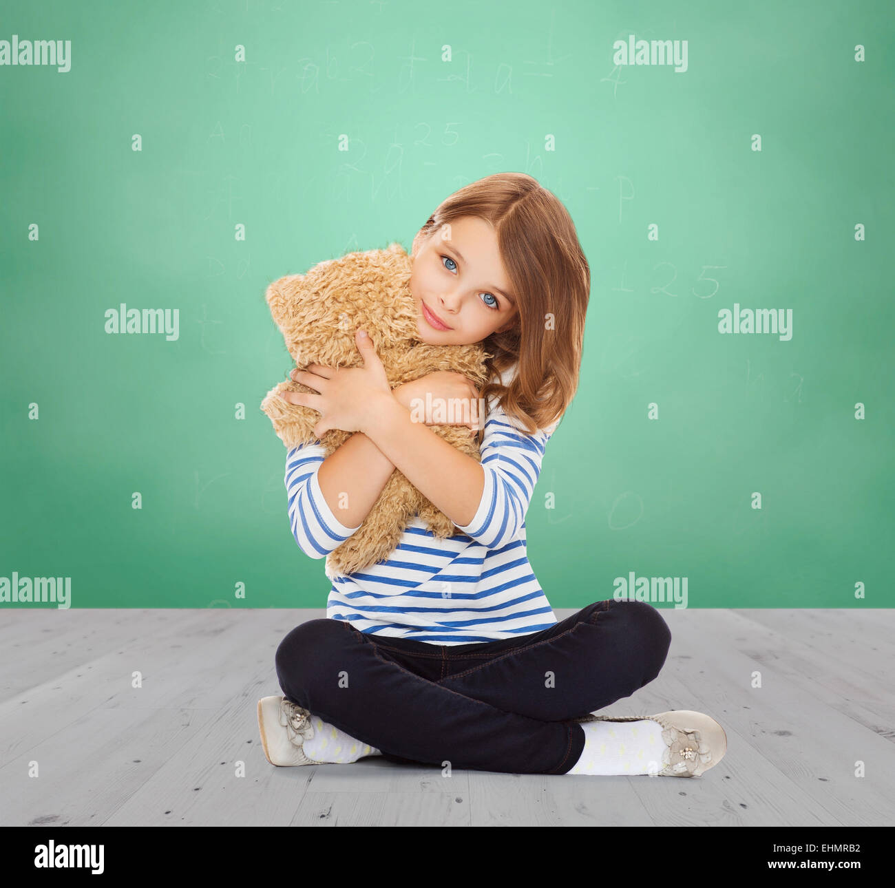 cute little girl hugging teddy bear Stock Photo - Alamy