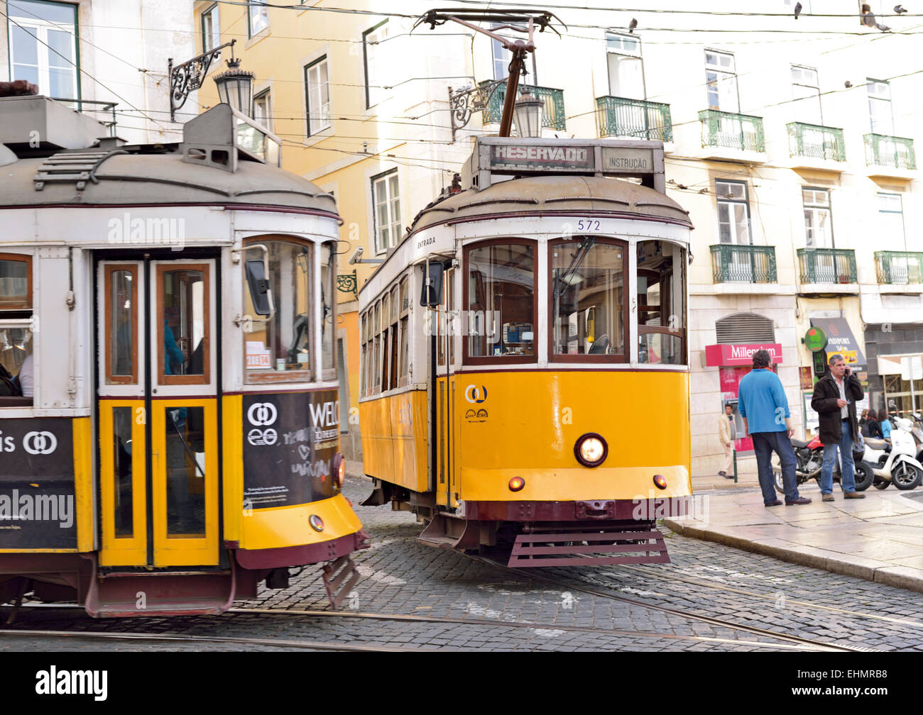 Portugal, Lisbon: Two historic trams meeting at the center Stock Photo ...