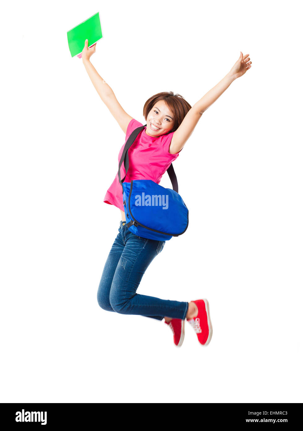 Young happy woman and student jumping Stock Photo - Alamy