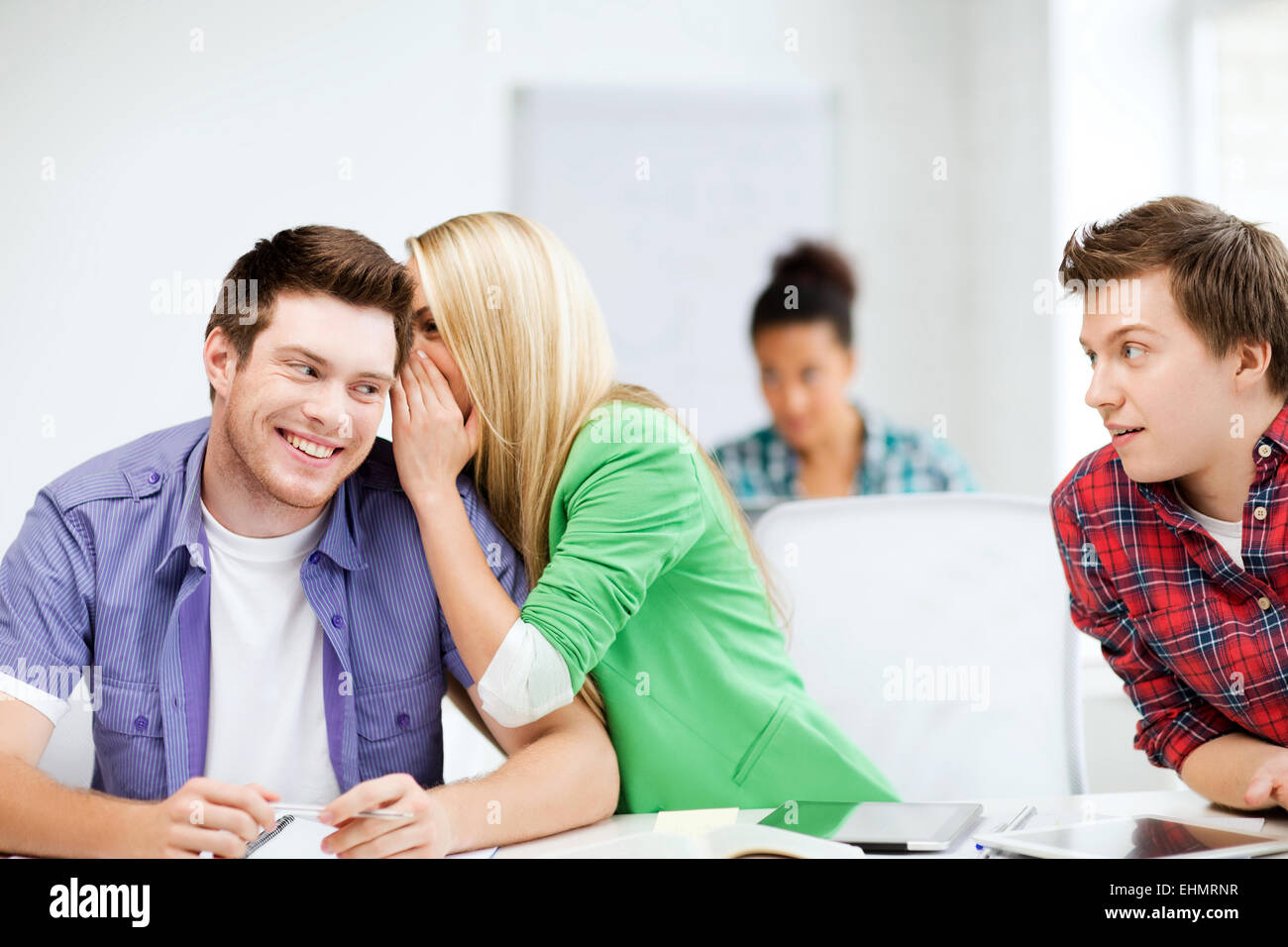 group of students gossiping at school Stock Photo - Alamy