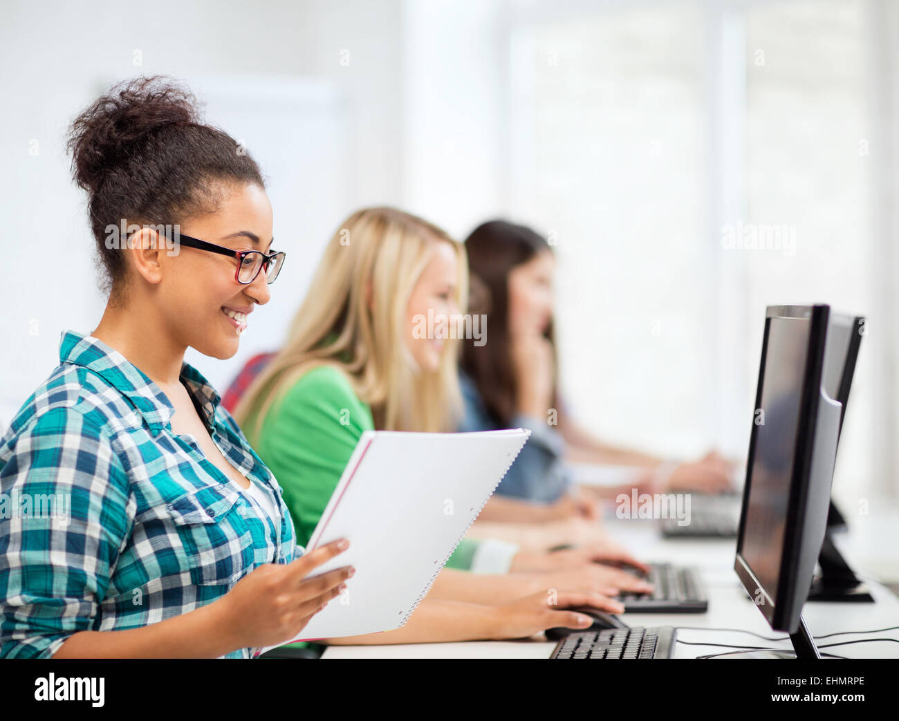 african student with computer studying at school Stock Photo - Alamy