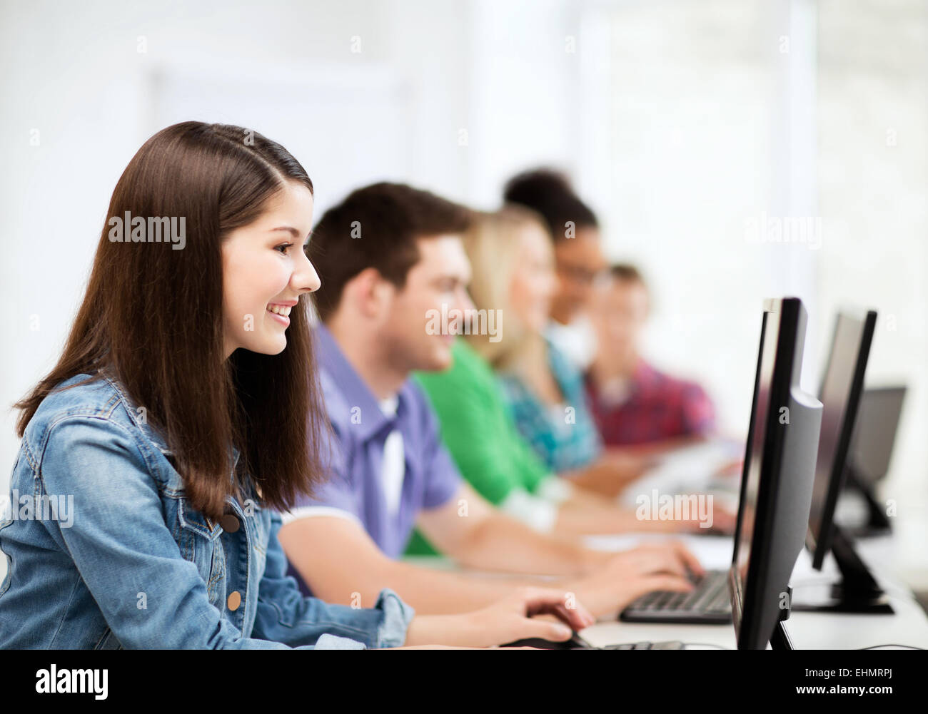 students with computers studying at school Stock Photo - Alamy
