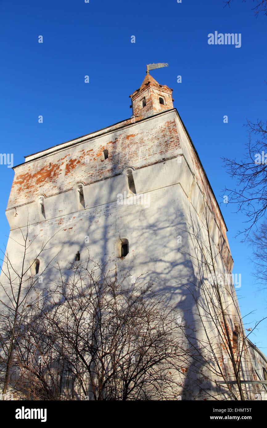 Old castle turret on blue sky background Stock Photo - Alamy