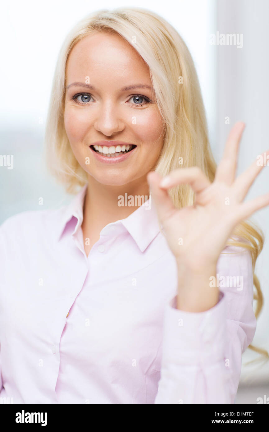 smiling businesswoman or secretary in office Stock Photo - Alamy