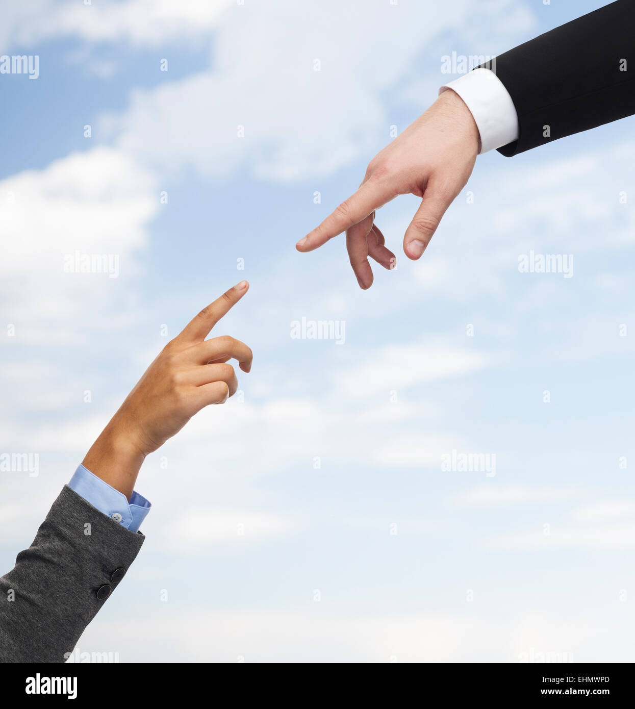 close up of woman and man hands trying to connect Stock Photo - Alamy