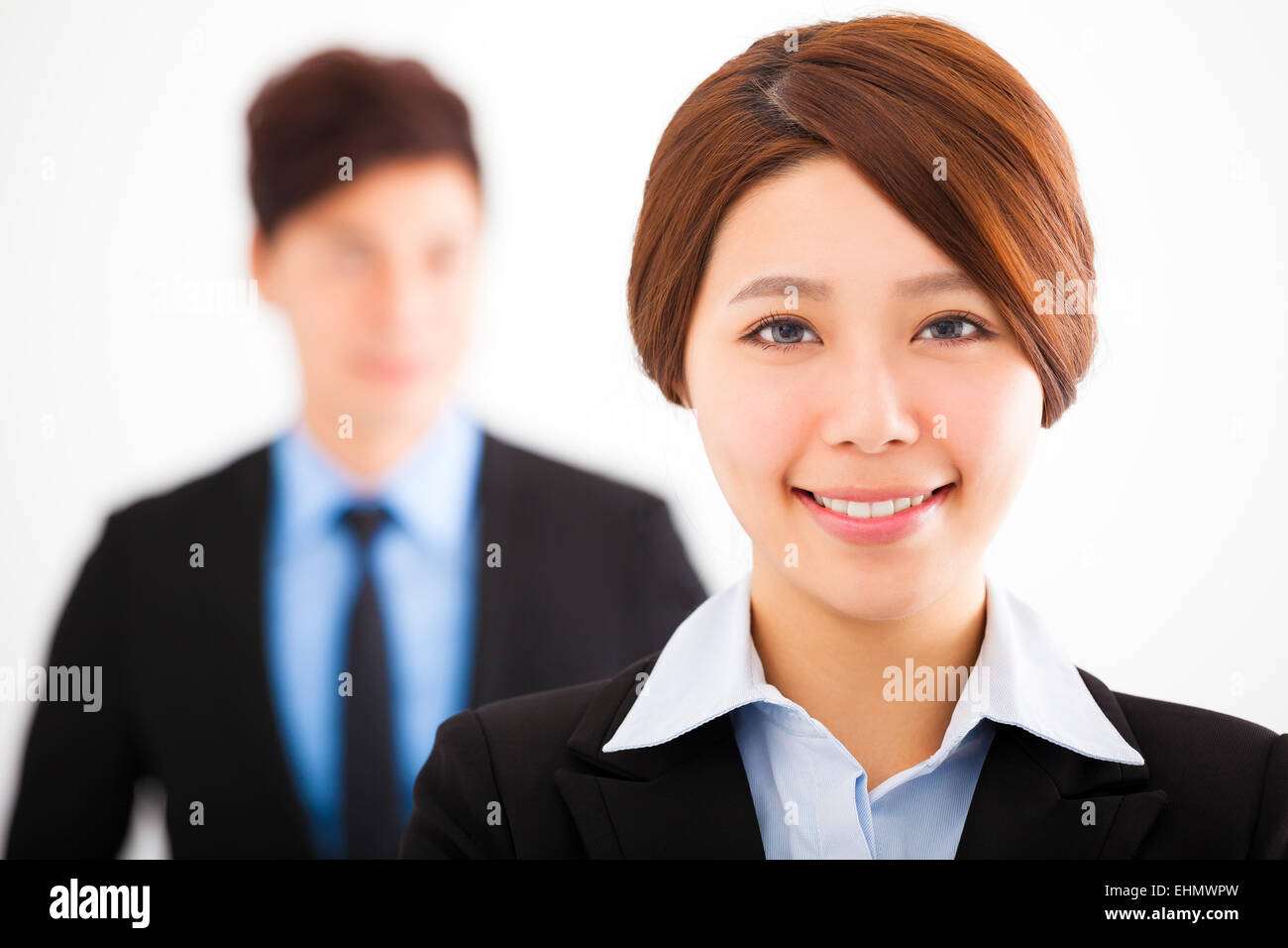 Two young happy colleagues hi-res stock photography and images - Alamy