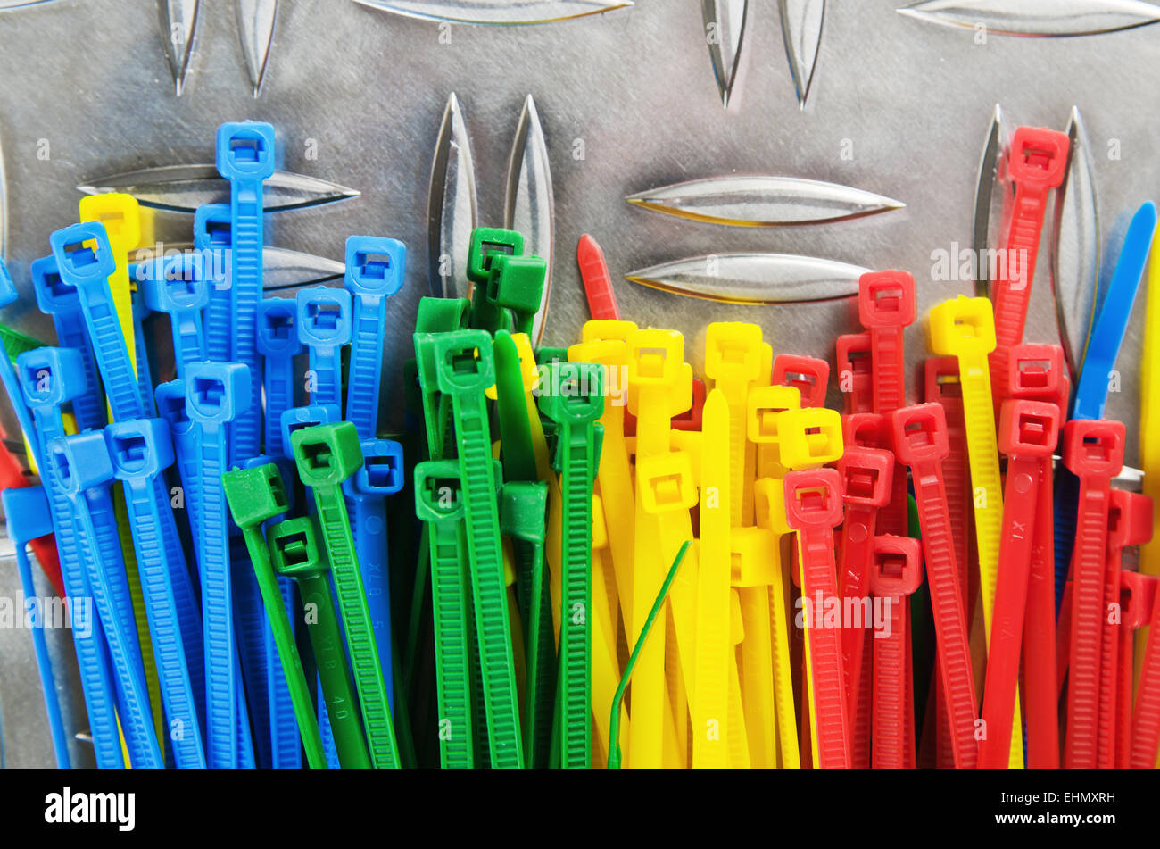 Set colored cable ties, close up Stock Photo - Alamy