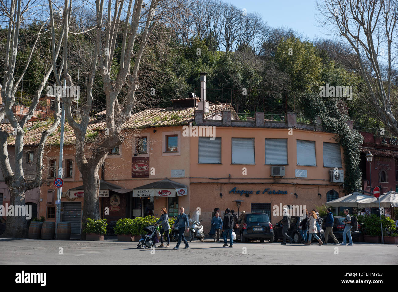 A trattoria in front of the mountain of broken amphorae Monte Testaccio ...