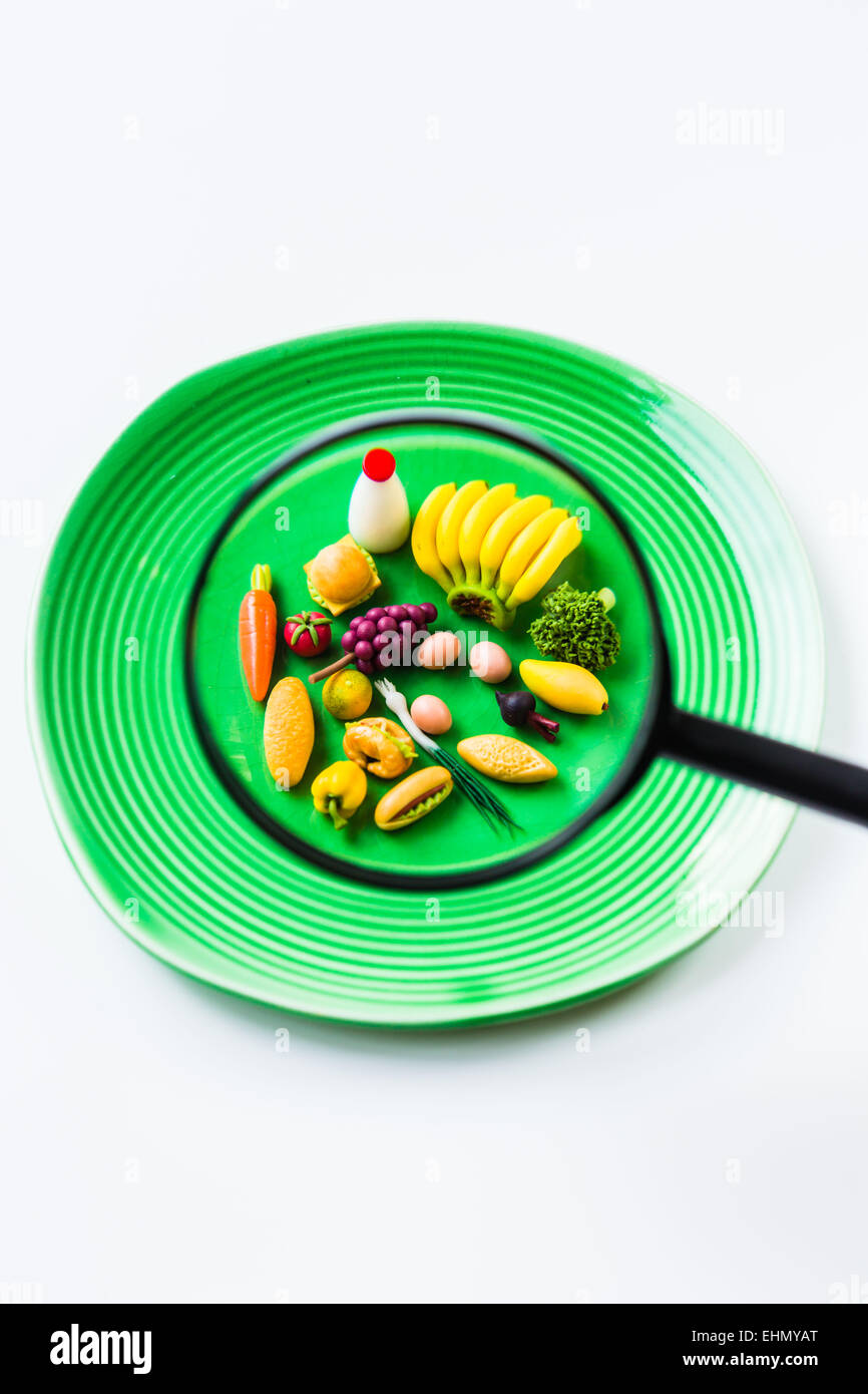 Food and magnifying glass Stock Photo - Alamy