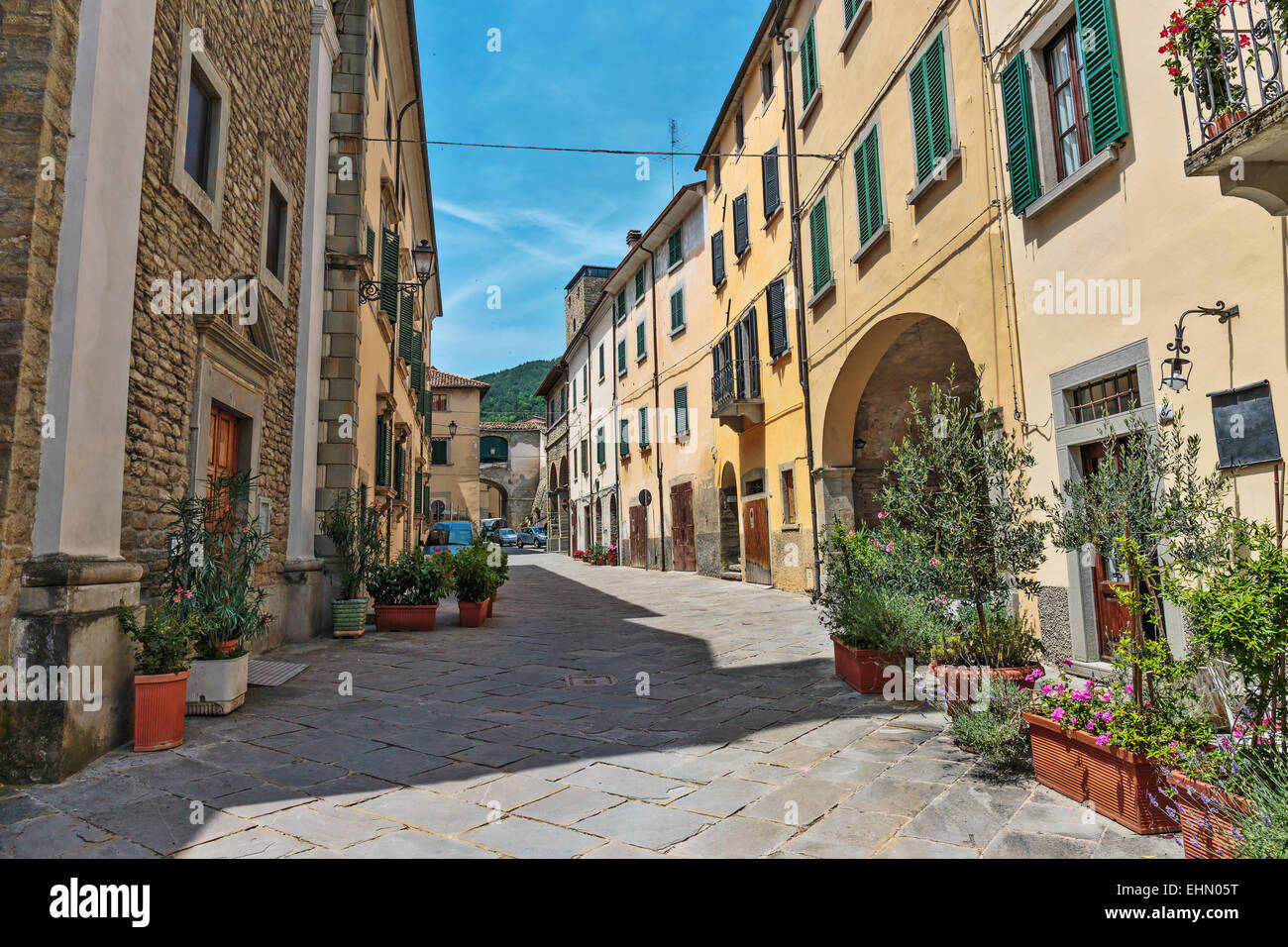 Narrow street in the old town in Italy Stock Photo - Alamy