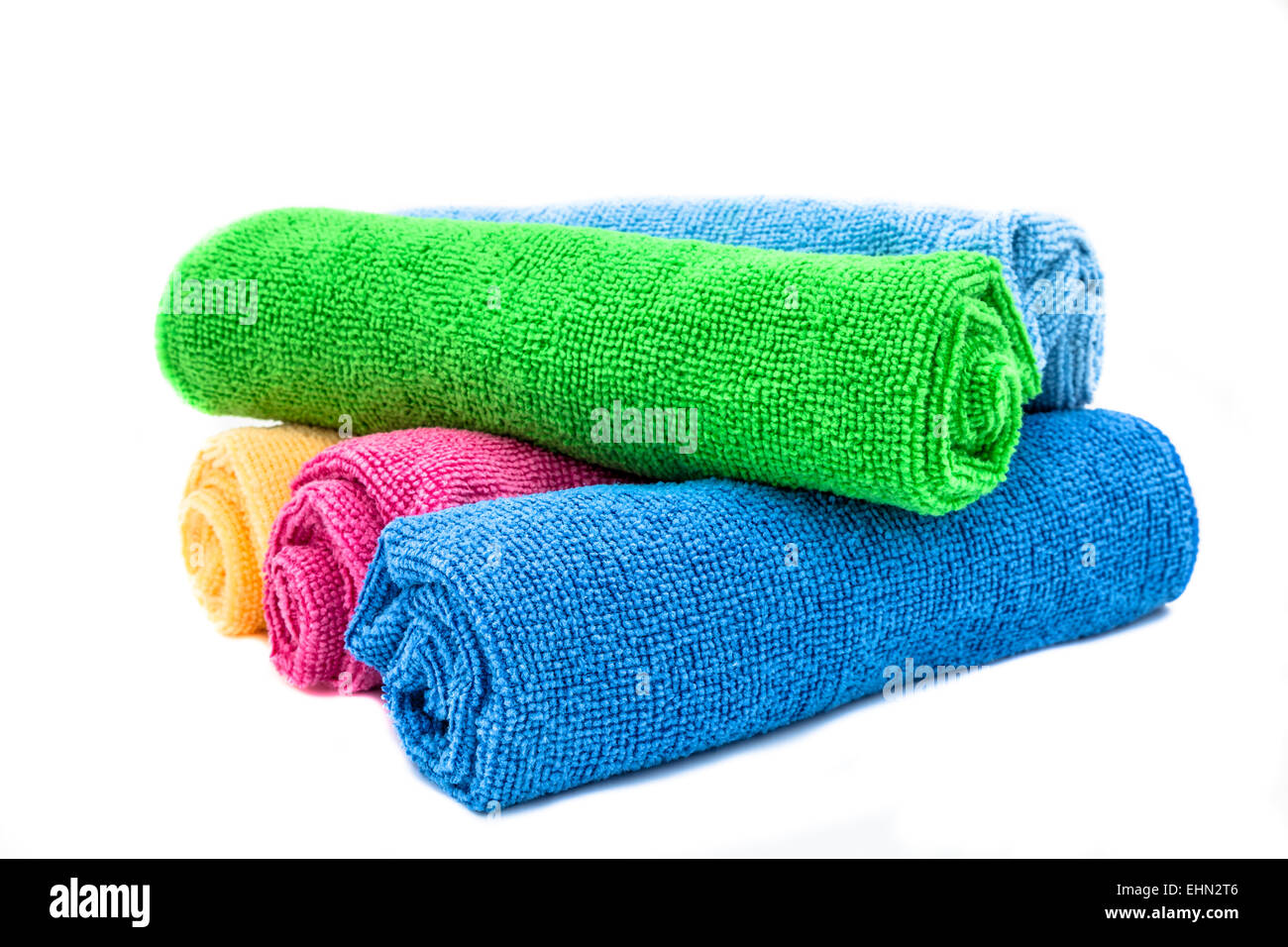 Colorful towels on a white background Stock Photo - Alamy