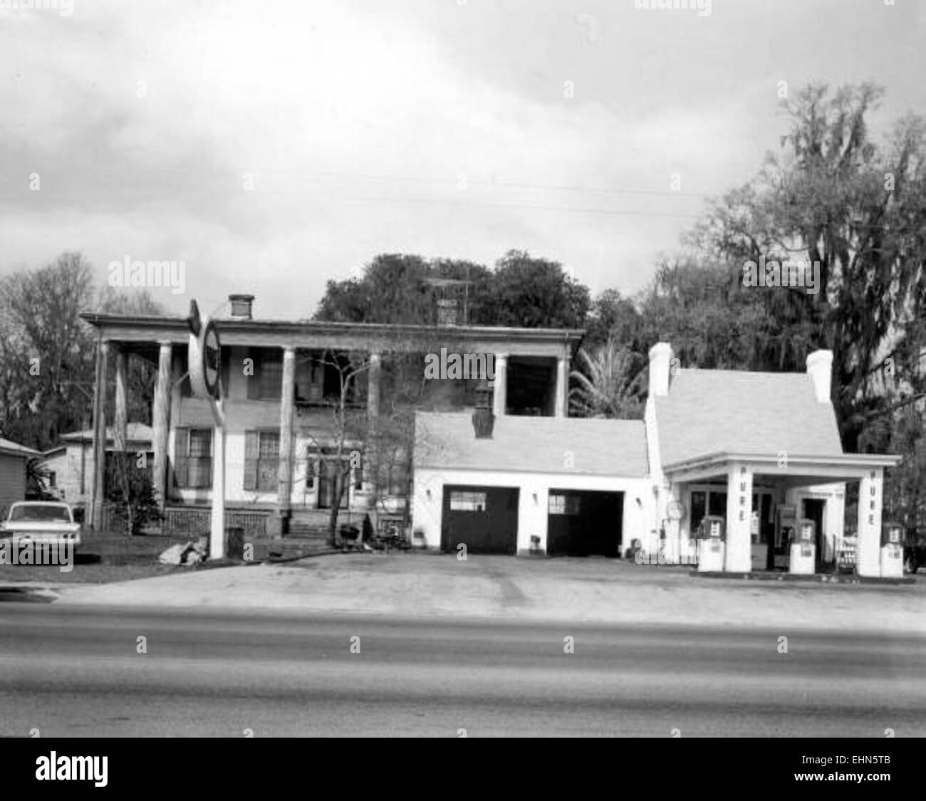 Ante bellum home behind the Pure Service Station - Madison Stock Photo ...