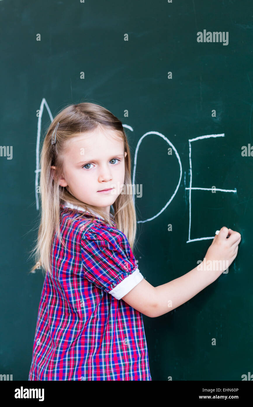 4 year old girl at school Stock Photo - Alamy