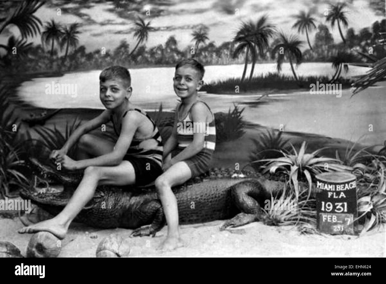 This image features Stanley and Milton Weinkle sitting on a stuffed ...