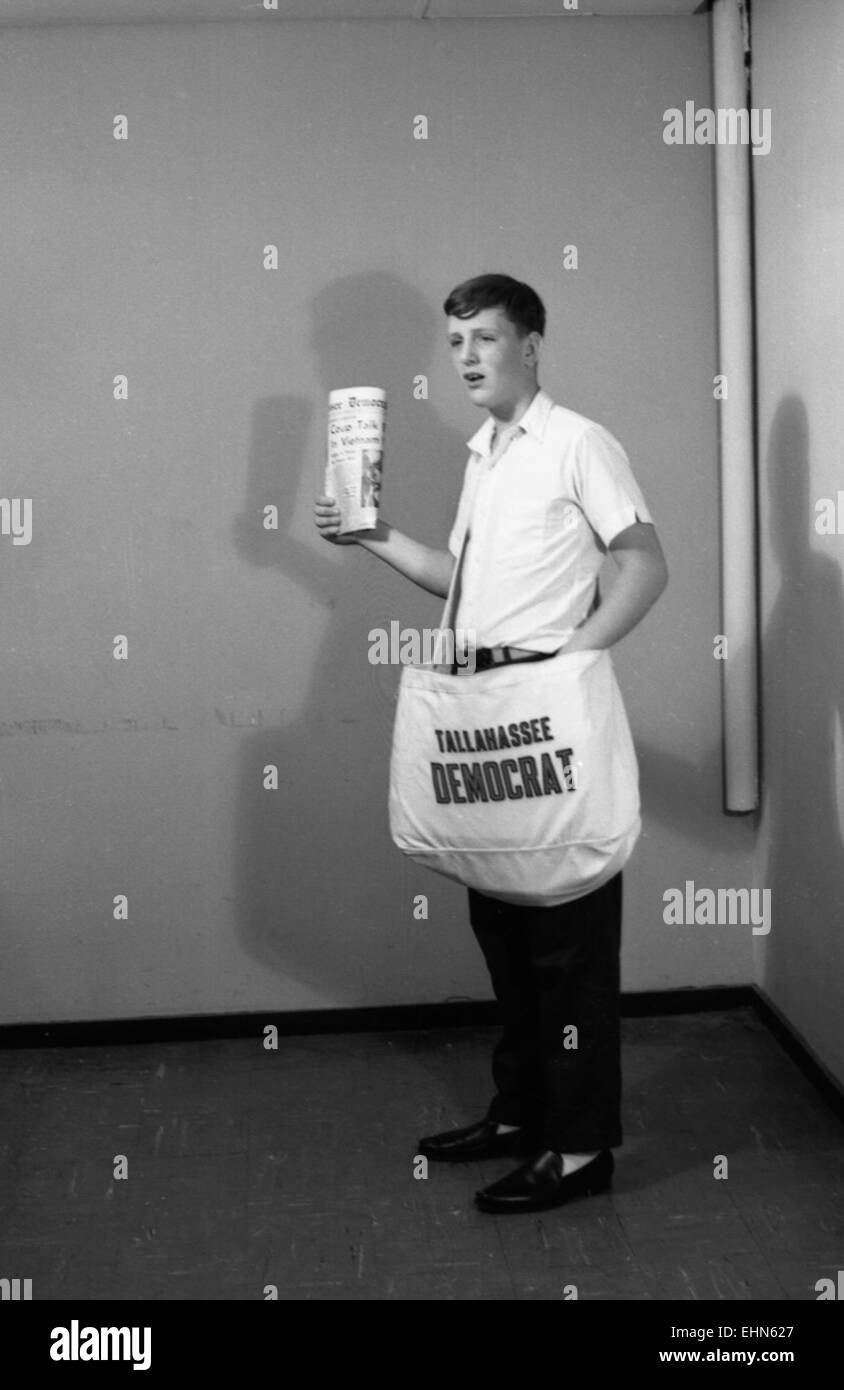 This historic photograph from the 20th century shows a delivery boy for ...