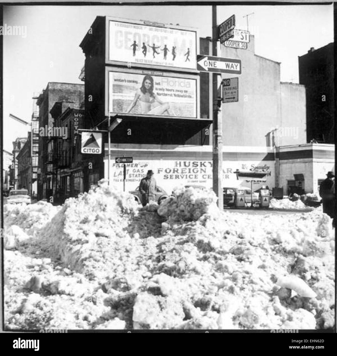 This photograph captures a vibrant billboard in New York City ...