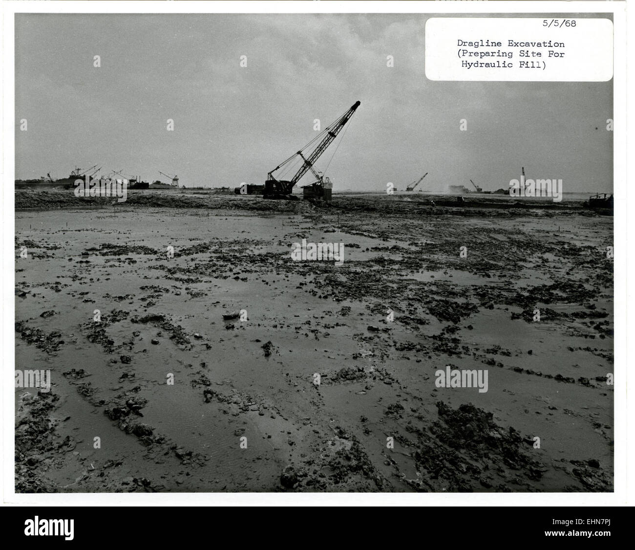 A photograph showing the dragline excavation process in preparation for ...