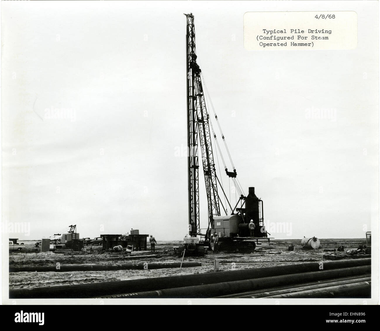 This illustration showcases a typical pile-driving setup using a steam ...