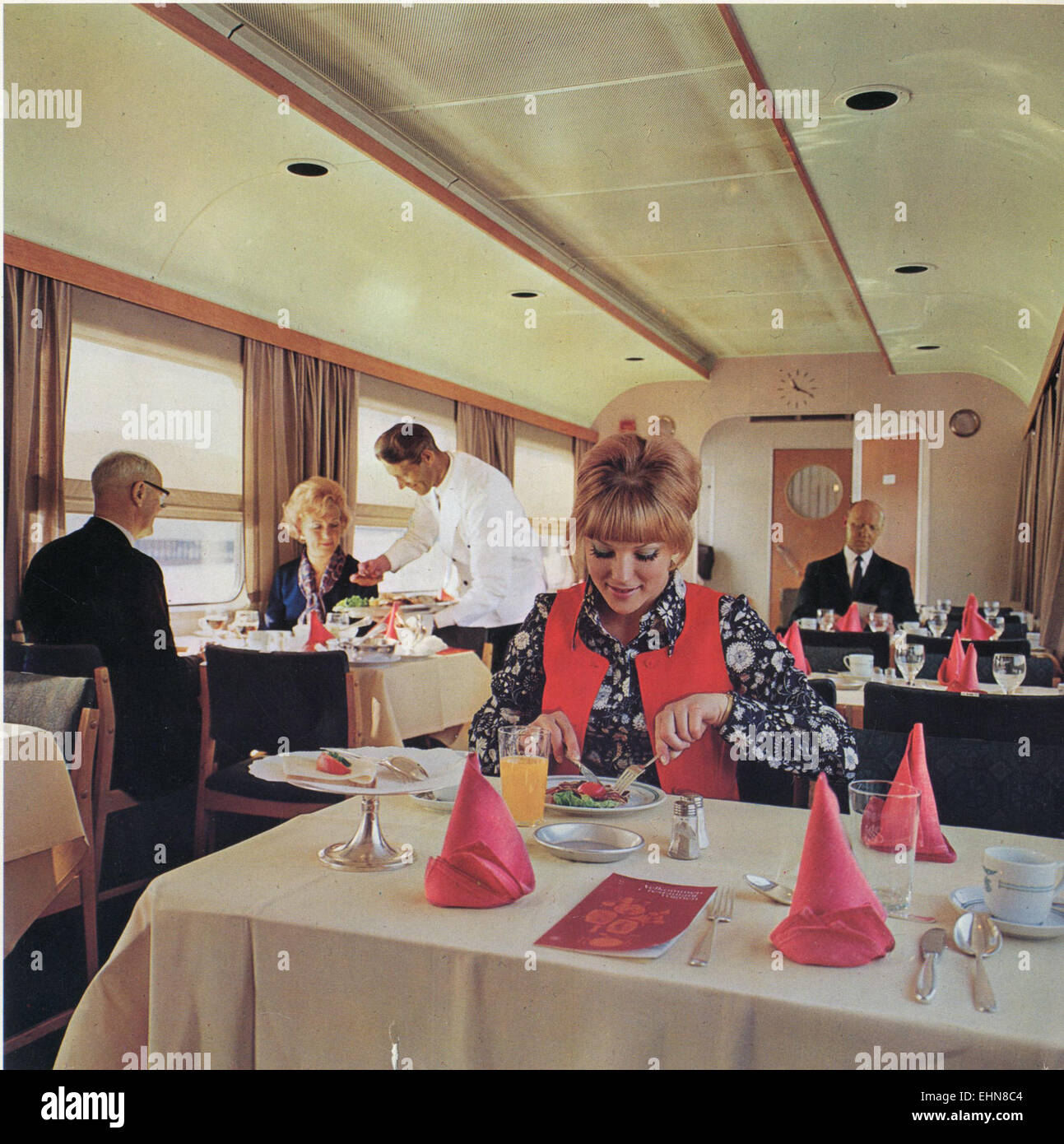 A historical image of a *spisevogn*, a type of dining carriage commonly ...