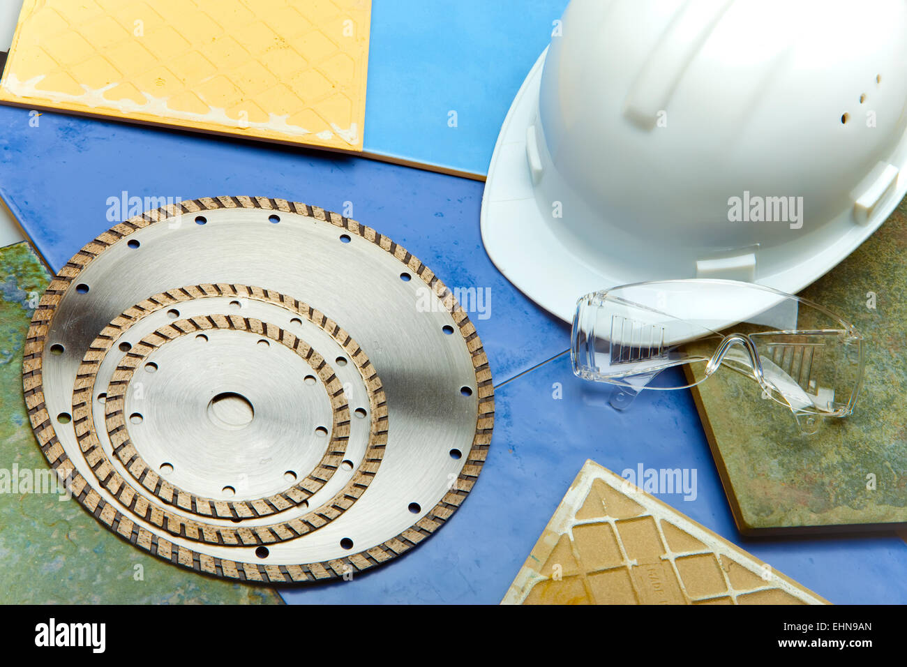 Diamond discs for cutting of tile, goggles Stock Photo - Alamy