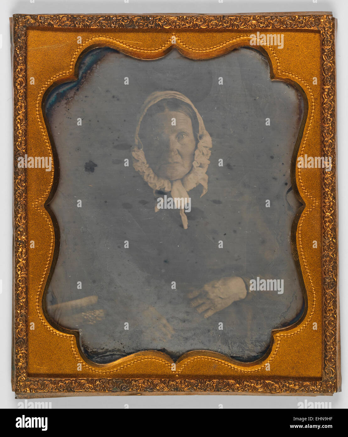 This cased photograph from the 19th century portrays Mrs. Dyer, the ...