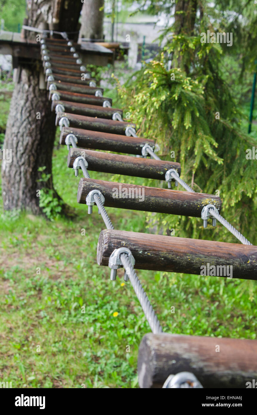 adventure climbing high wire park Stock Photo - Alamy
