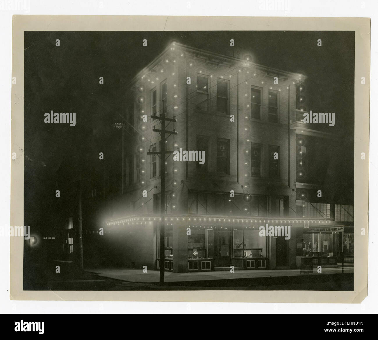 An illuminated business building in Amarillo, Texas, stands as a ...