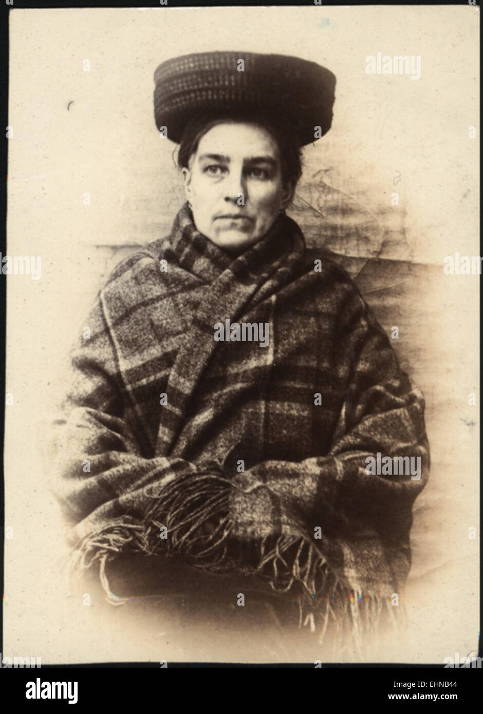 This mugshot shows an arrested individual named Elizabeth Cross, taken ...