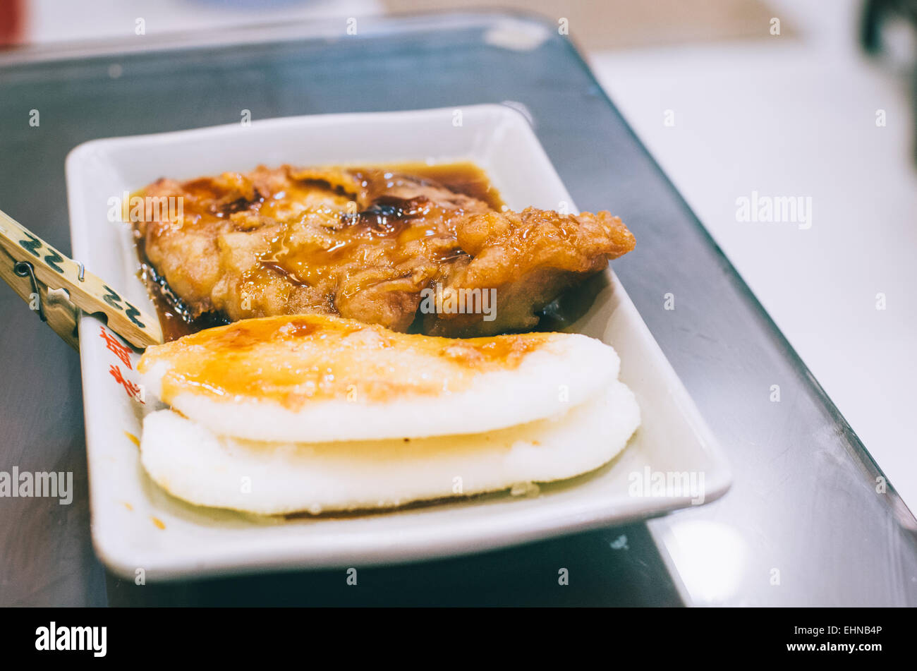 Shanghai sticky rice with pork chop, a common dish in shanghai of China ...
